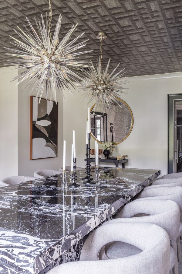 Dining room features marble table made by homeowner - DesignNJ